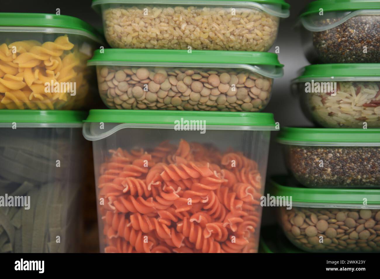 Plastic containers filled with food products, closeup Stock Photo - Alamy