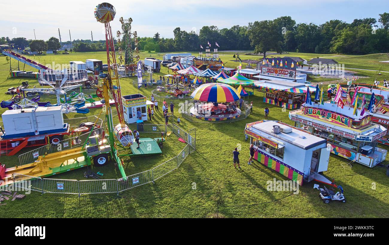 Aerial View of Festive Fairground with Amusement Rides and Food Stalls ...