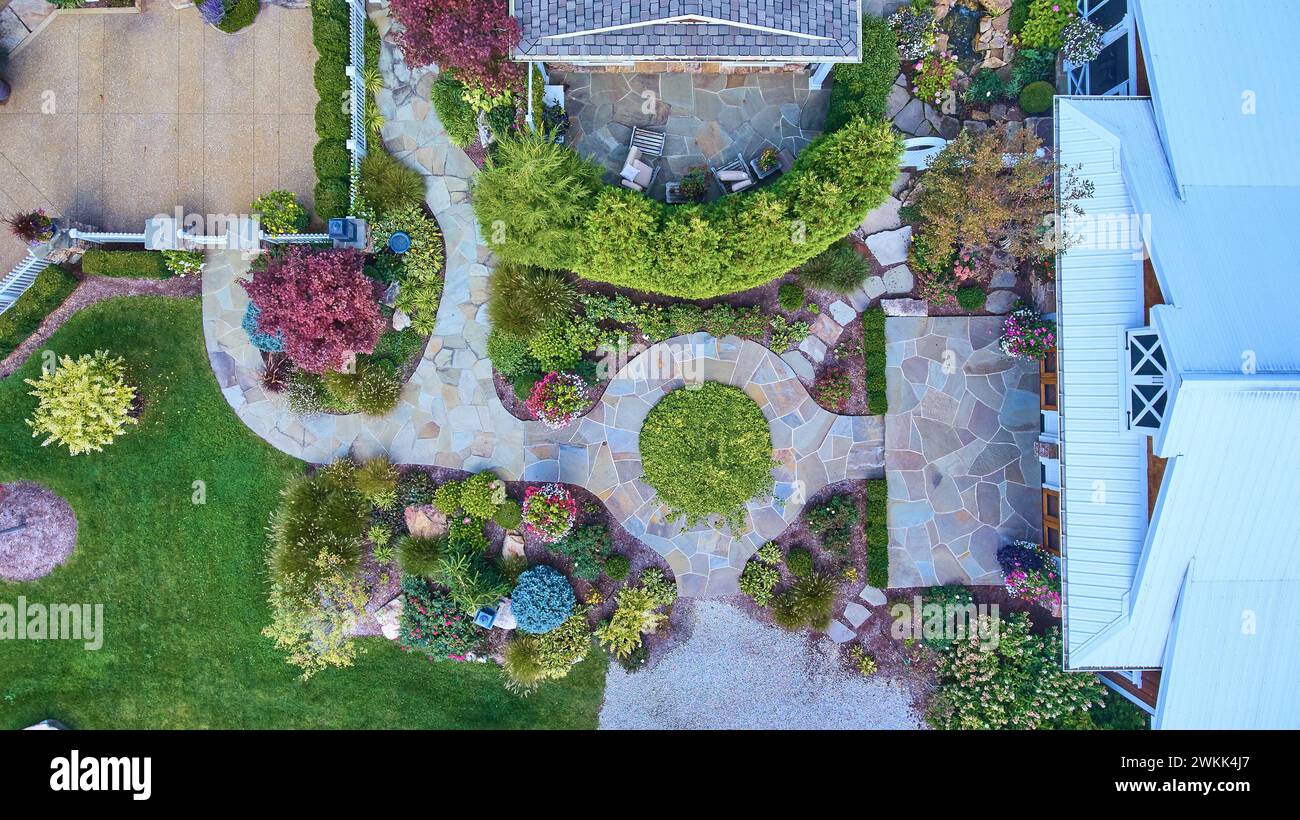 Aerial View of Lush Residential Garden with Stone Patio and Gazebo ...