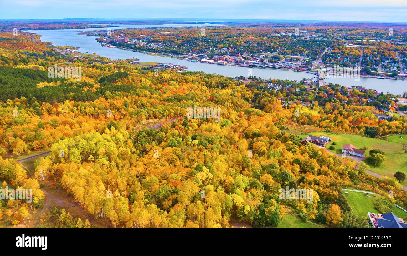Aerial View of Autumn Forest and Riverside Town with Bridge Stock Photo ...