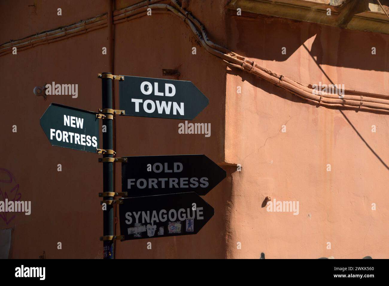 Black Metal Signpost for New, Old Fortress, Synagogue & Old Town in ...