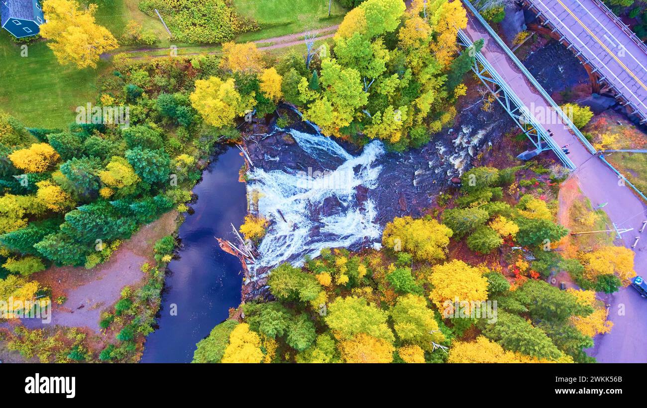 Aerial View of Autumn Waterfall and Bridge in Forest Landscape Stock ...