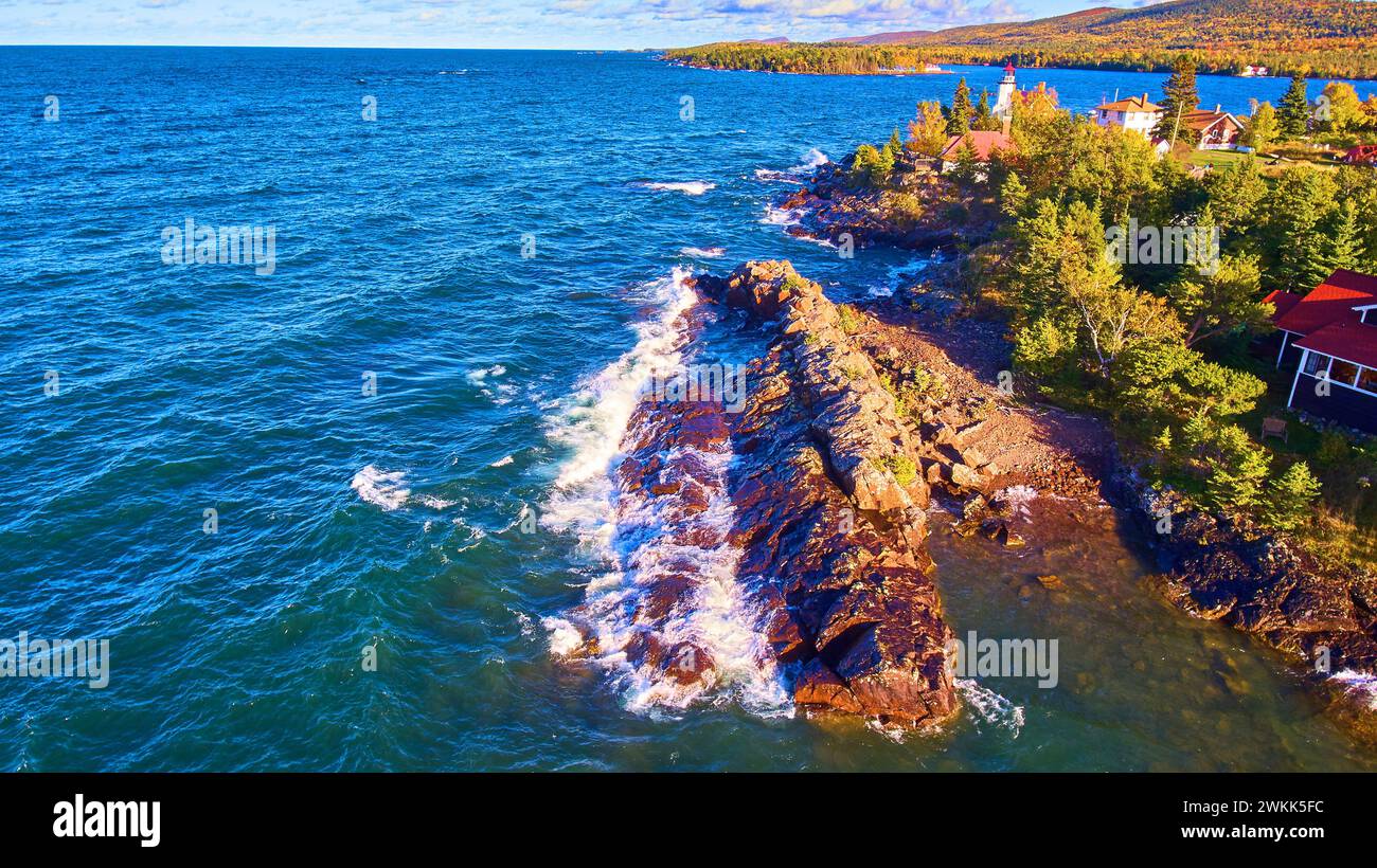 Aerial View of Eagle Harbor Lighthouse and Rocky Coastline Stock Photo ...