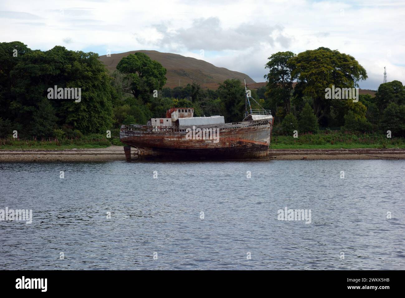 A Rusty Old Fishing Boat (Shipwreck) on the Beach between Loch Linnhe ...