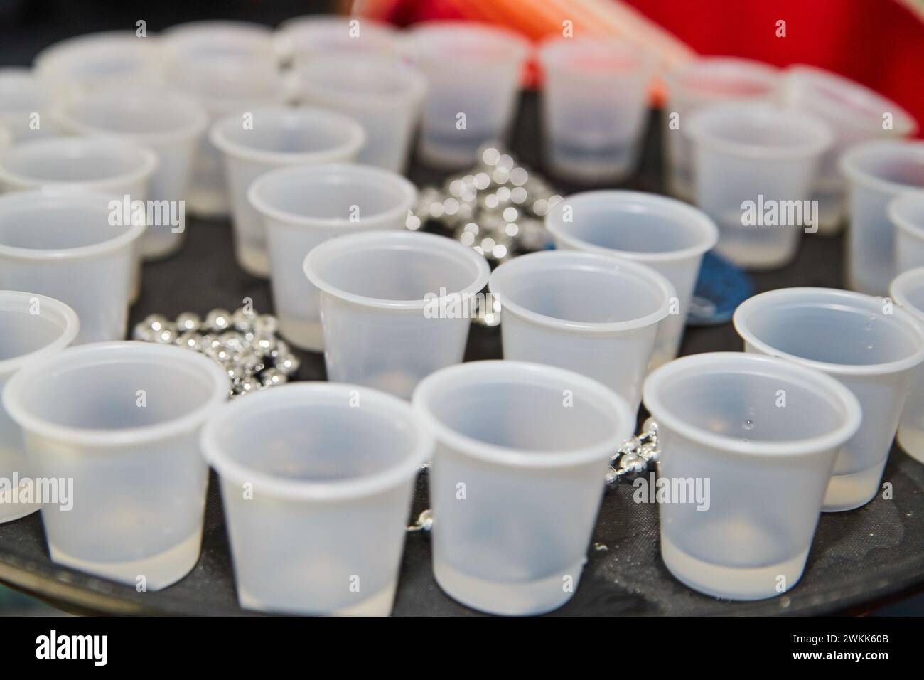 Plastic Cups and Metallic Beads Party Setup, Eye-Level View Stock Photo ...