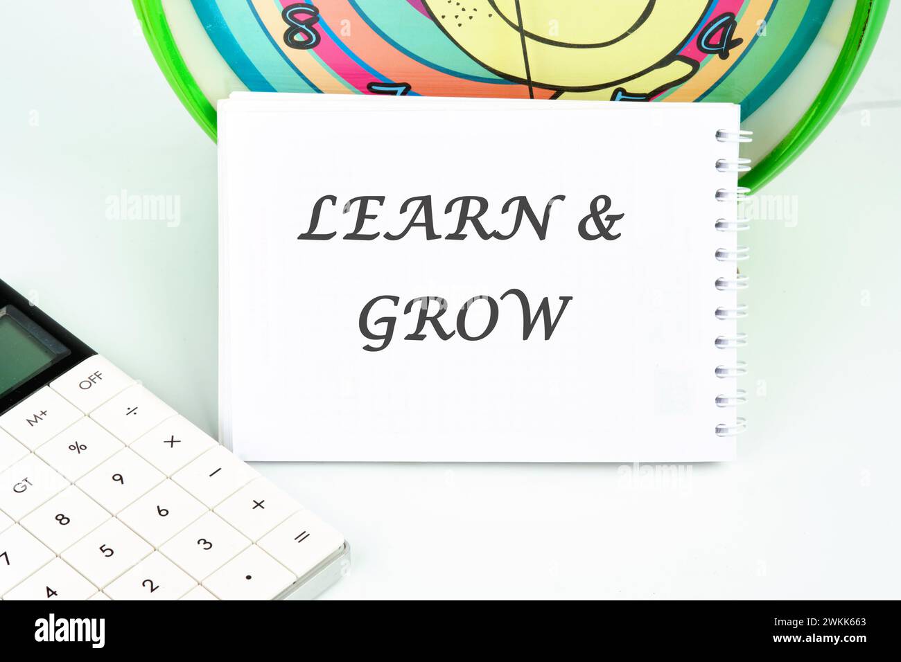 Learn and Grow written on a white card Stock Photo - Alamy