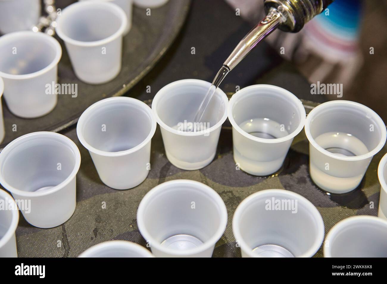 Pouring Beverage at Cinco de Mayo Party - Close-Up on Plastic Cups ...