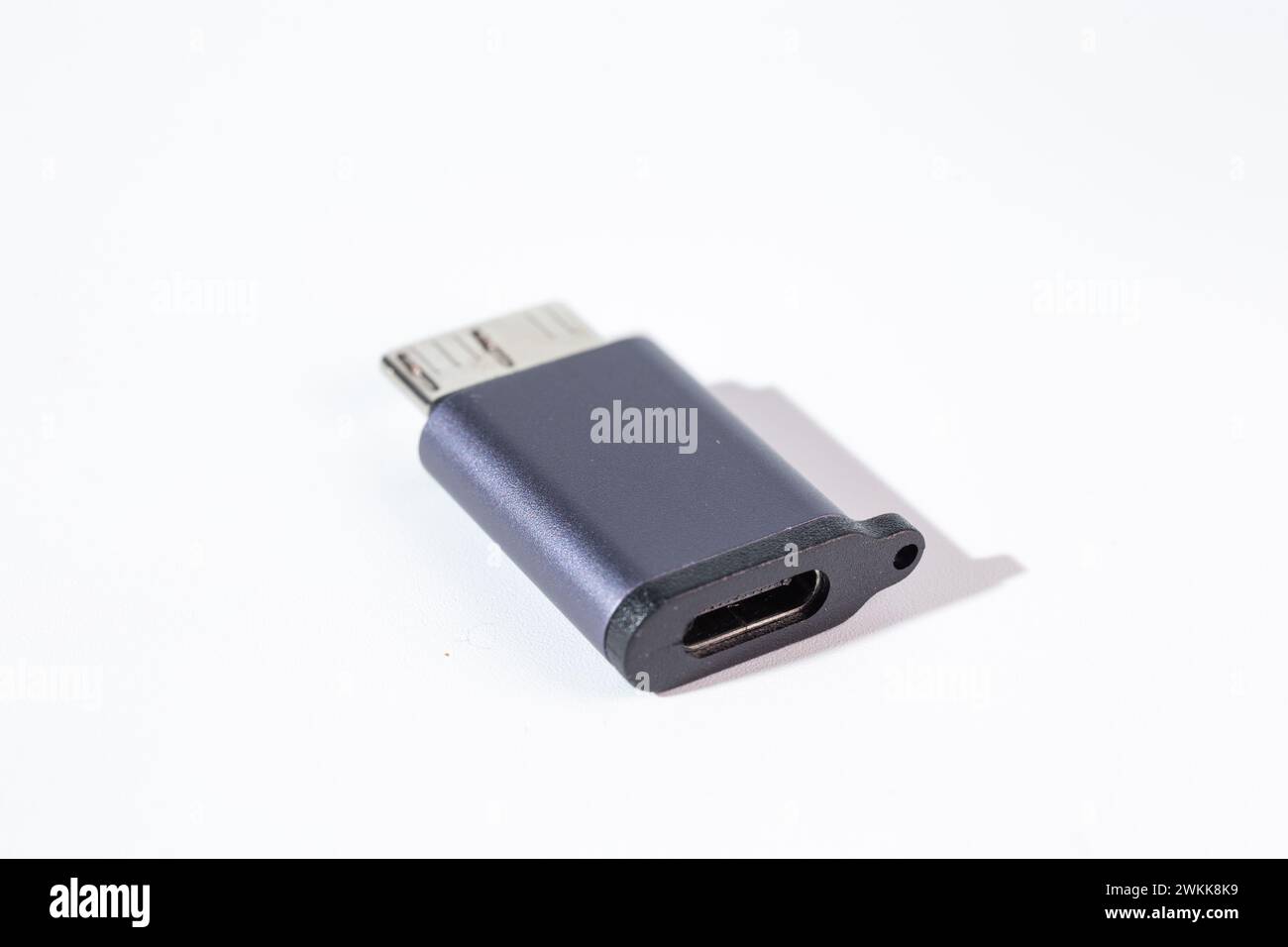 The image shows a dark grey USB 3.2 flash drive with a Type-C connector ...