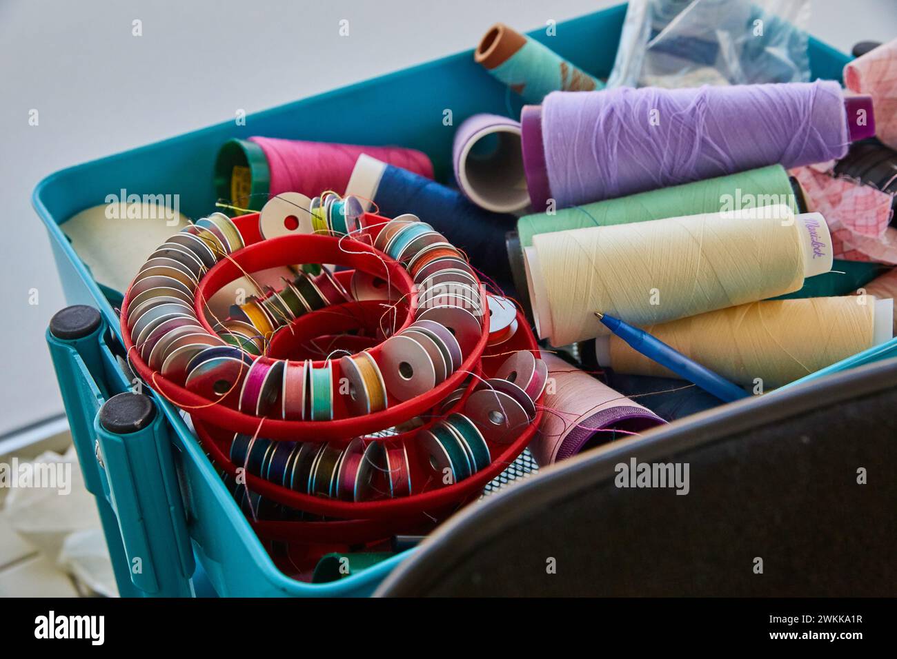 Colorful Thread Spools and Bobbins in Sewing Bin, Craft Room View Stock ...