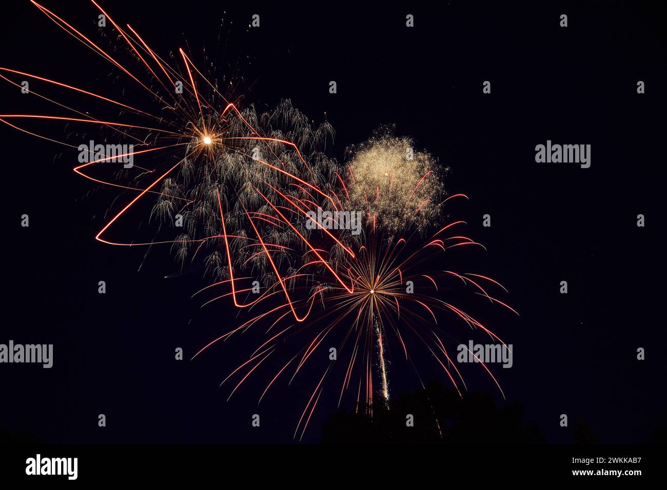 Red and Gold Fireworks Display at Night with Motion Blur Effect Stock ...