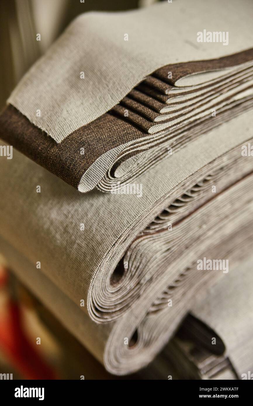 Neutral Linen Fabric Stack Close-Up on Wooden Surface Stock Photo - Alamy