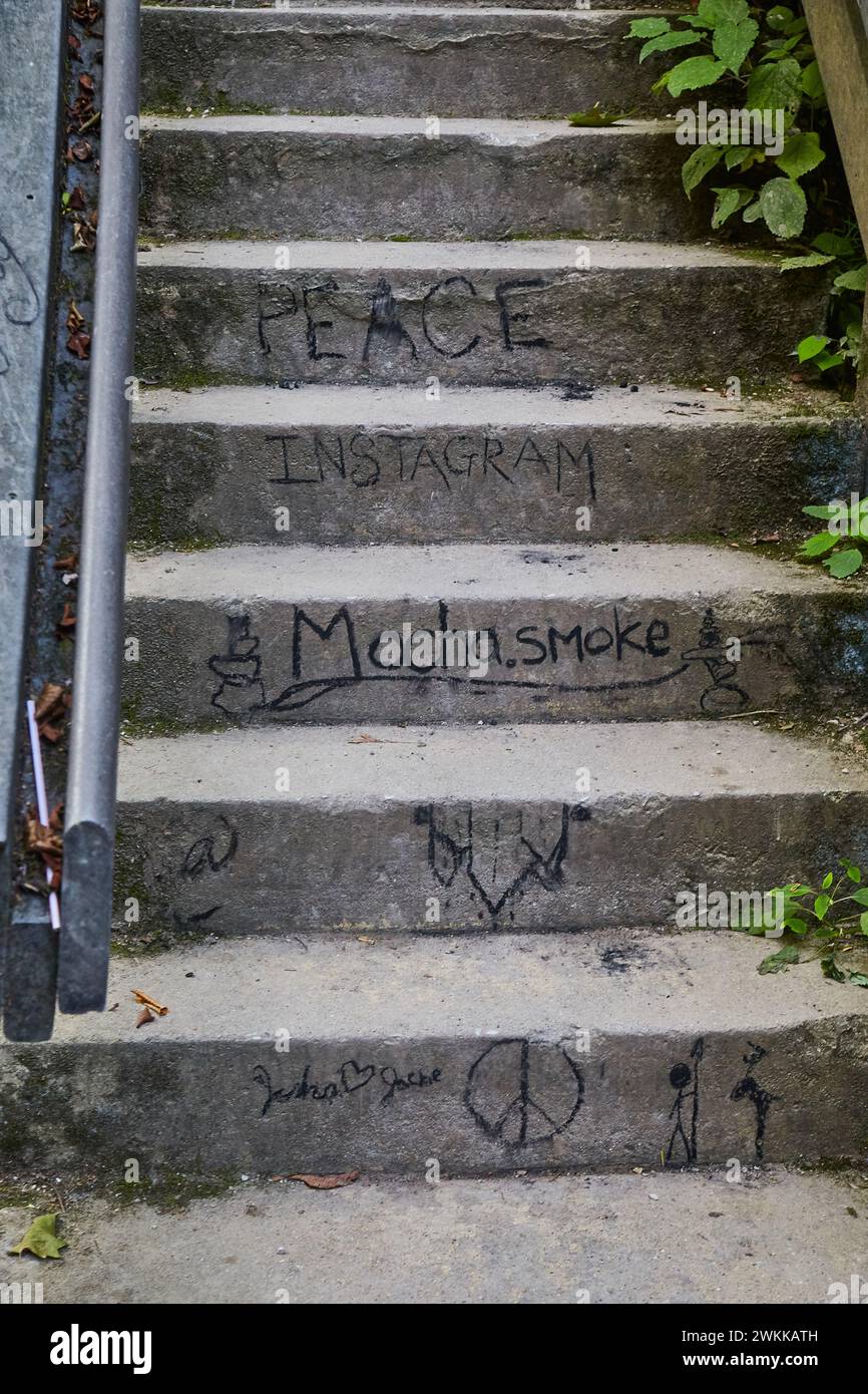 Graffiti-Adorned Urban Stairs with Social Messages, Ascending View ...
