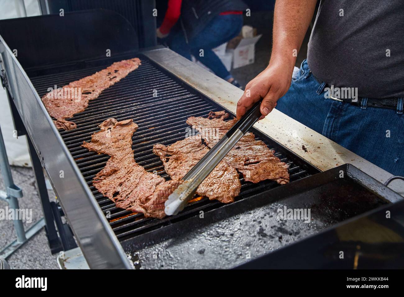 Grilling Meat at Cinco de Mayo Celebration, Casual Cookout Perspective ...