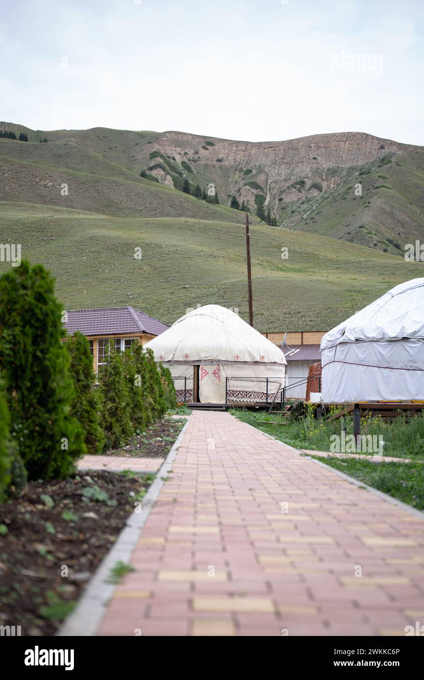 The yurt, a nomadic tent of Central Asia, is round, made of felt or ...