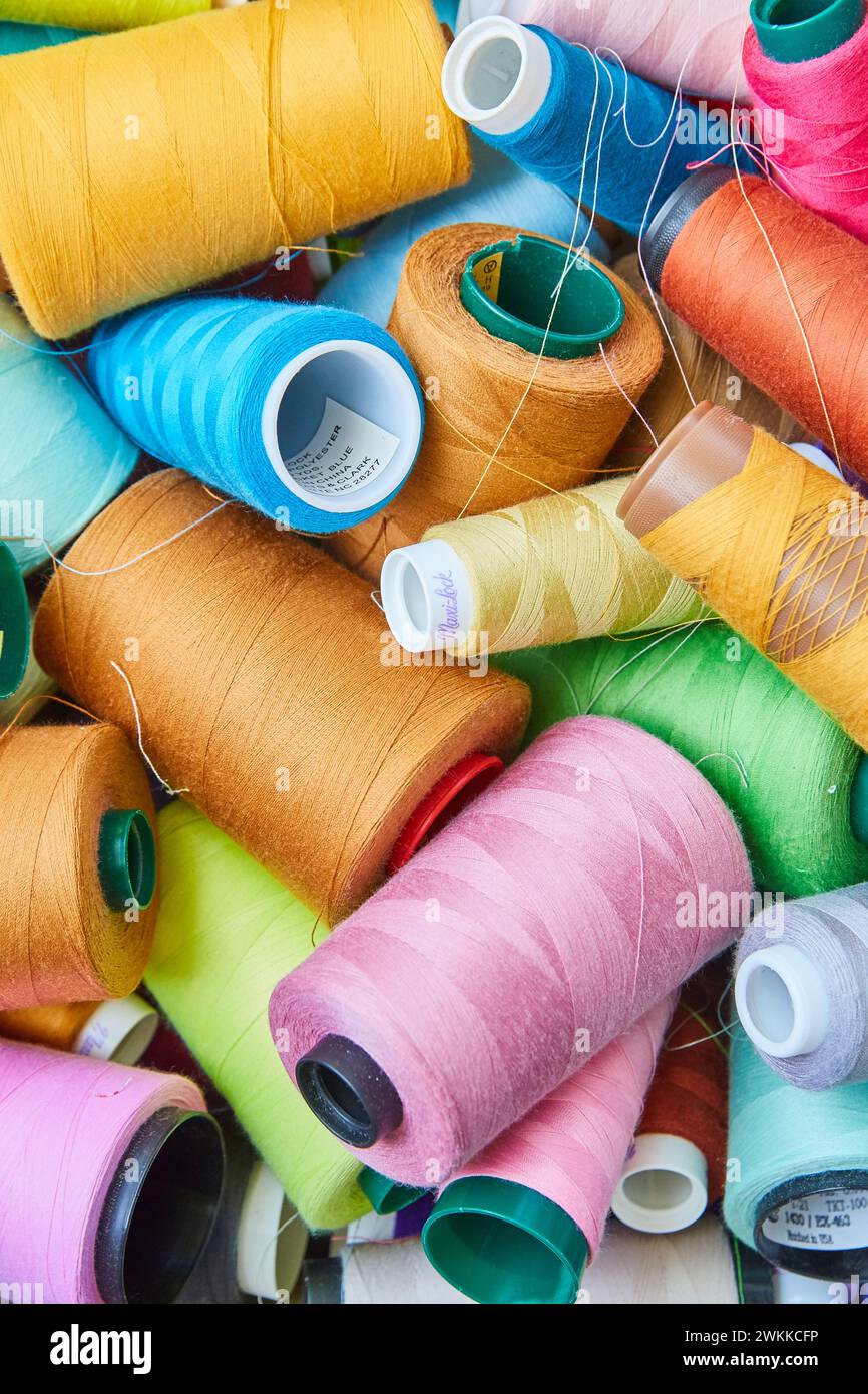Colorful Sewing Threads in Creative Disarray, Top View Stock Photo - Alamy
