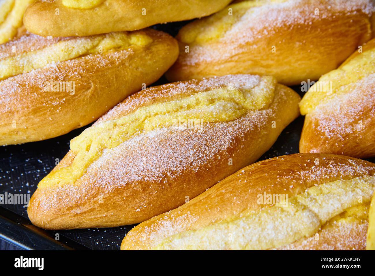 Golden-Brown Twisted Sweet Bread with Sugar Crystals on Tray Close-Up ...