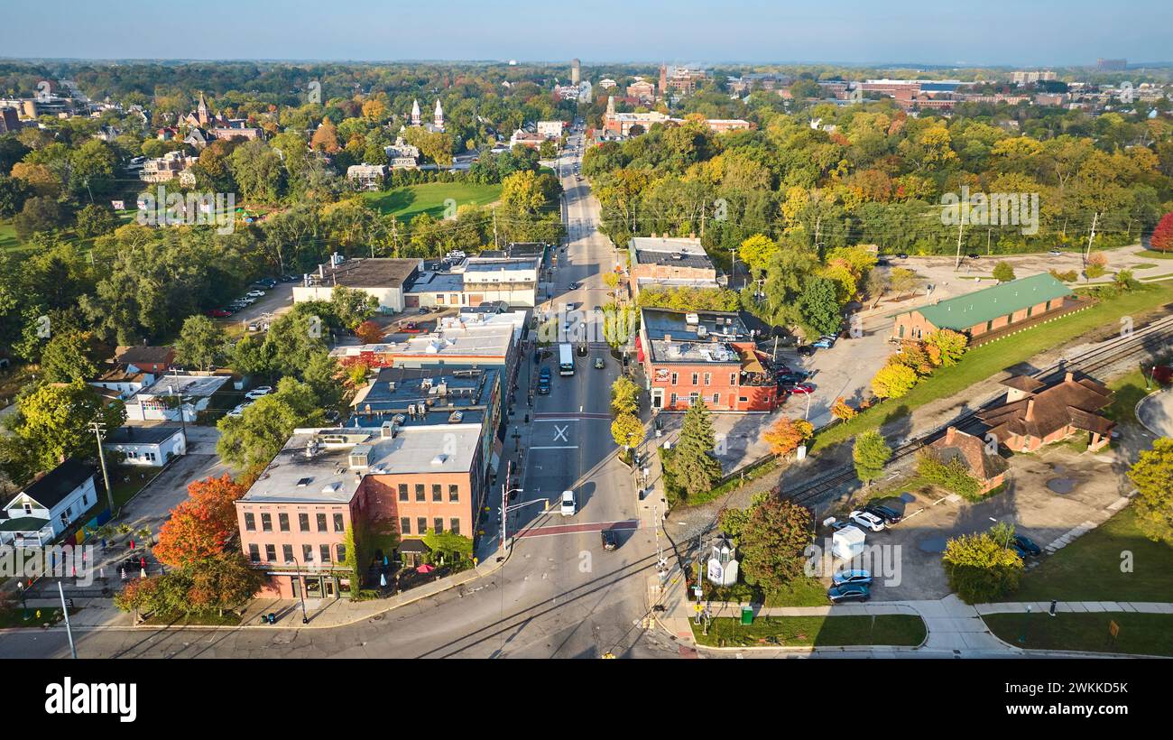 Aerial View of Autumnal Small Town with Main Street and Railroad ...