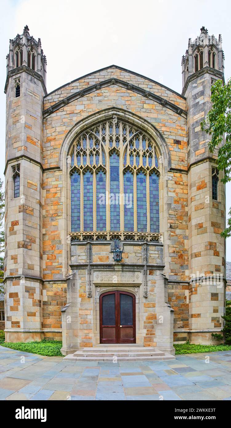 Majestic Gothic Revival Church Facade with Stained Glass, Overcast Sky ...