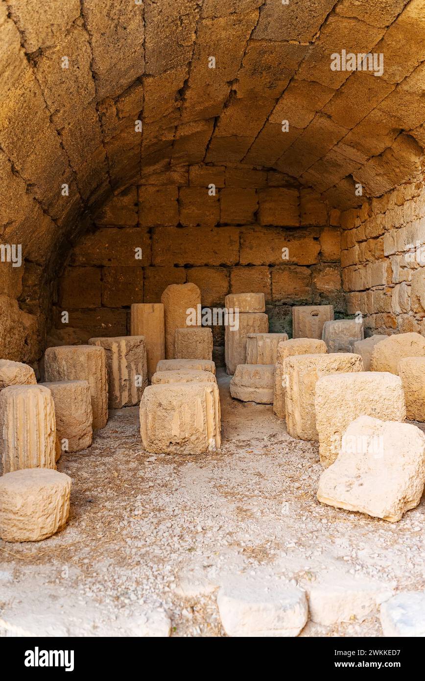 Many fragments of ancient Greek columns Stock Photo - Alamy