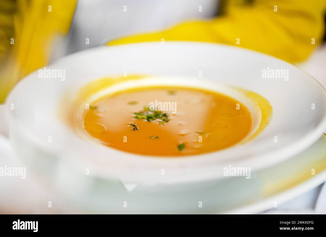 Woman cooking soup in bowl hi-res stock photography and images - Alamy