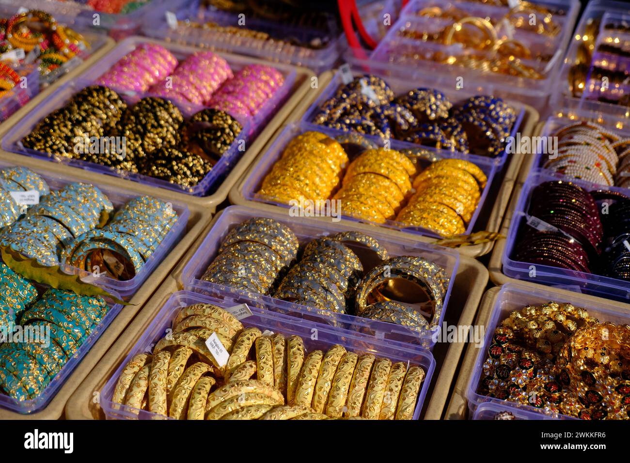Indian colorful bangles displayed in local shop in a market of Pune ...