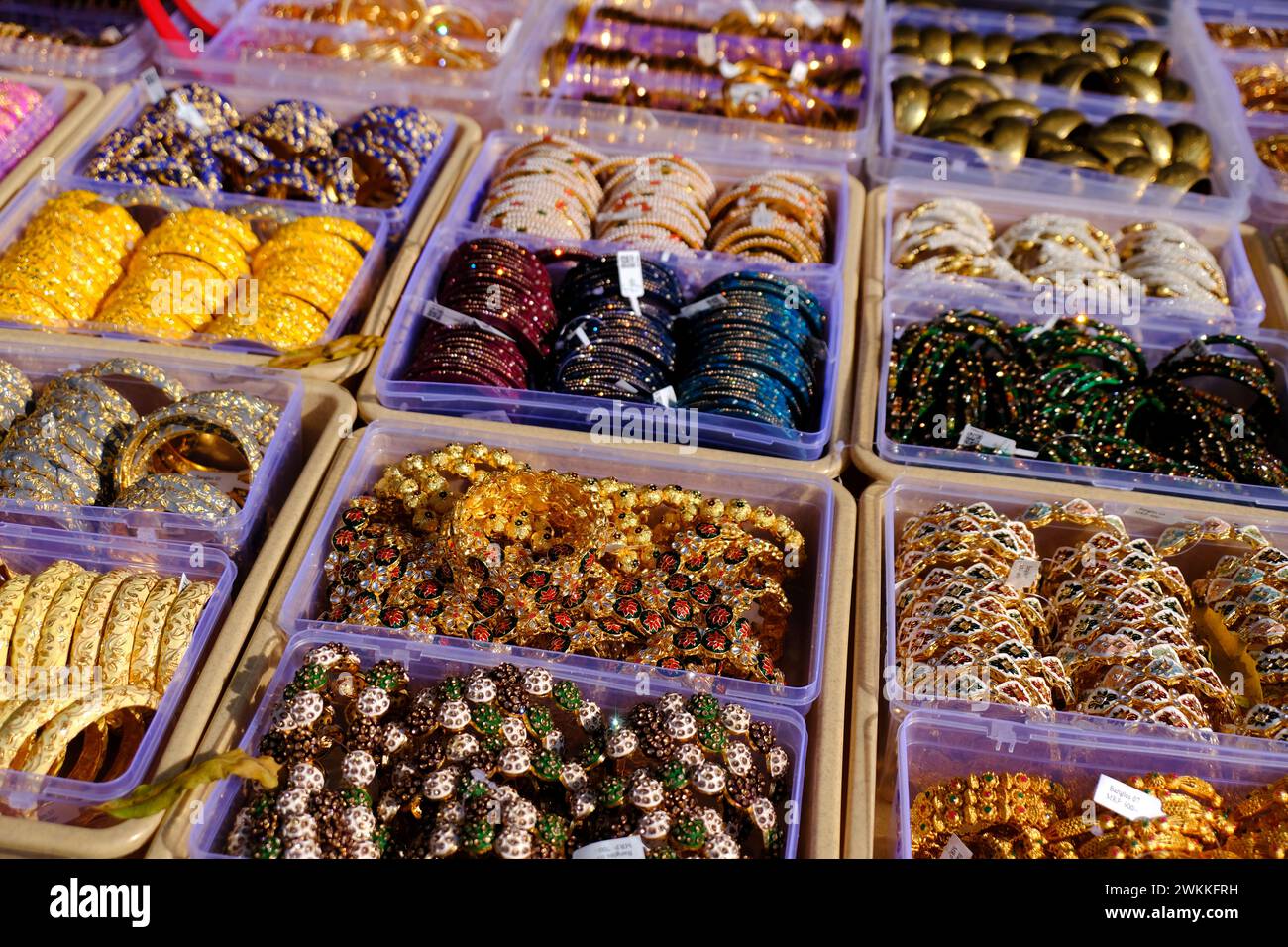 Indian colorful bangles displayed in local shop in a market of Pune ...