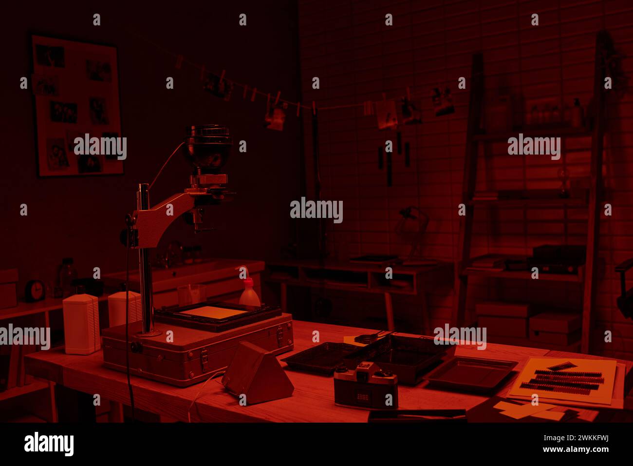 darkroom interior with red light, showcasing the process of film ...