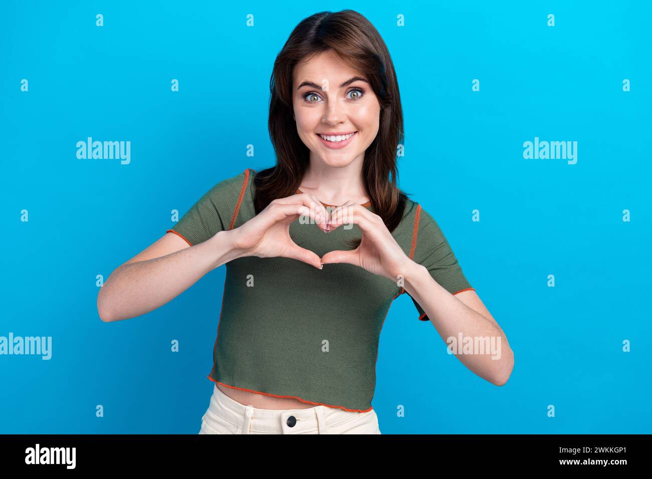 Photo of lovely friendly lady toothy smile hands fingers demonstrate ...