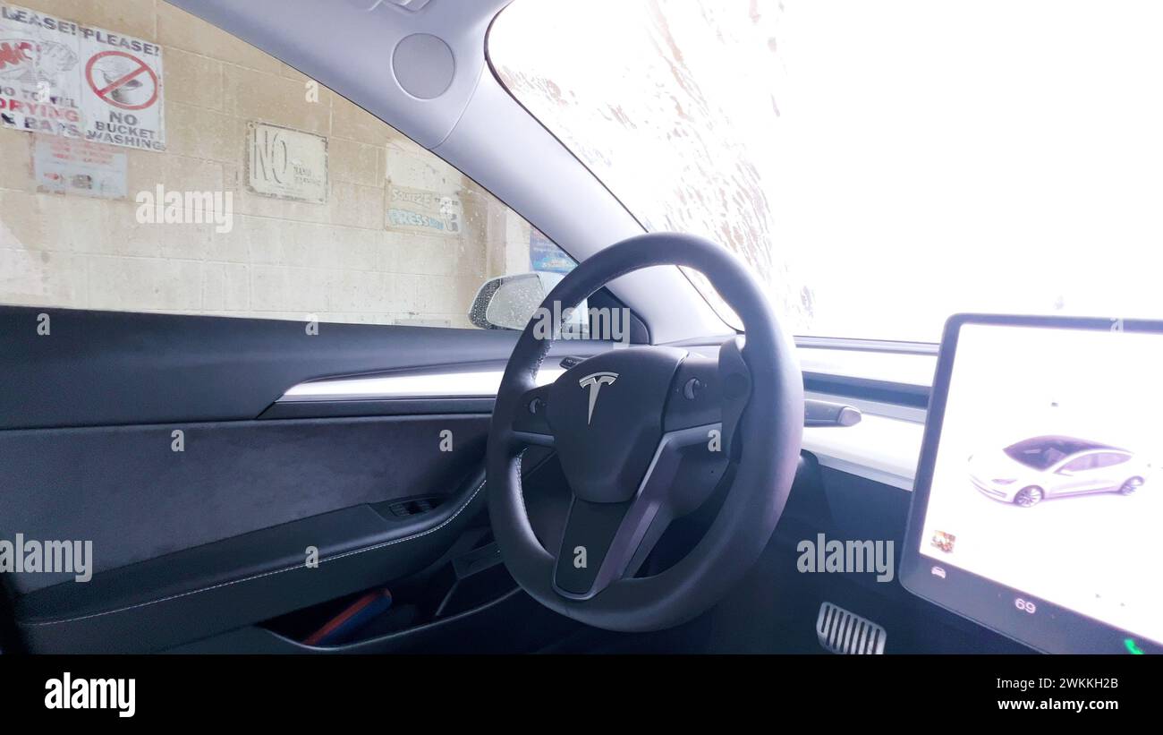 Inside View of a Tesla Model 3 During a Self-Service Car Wash Stock ...