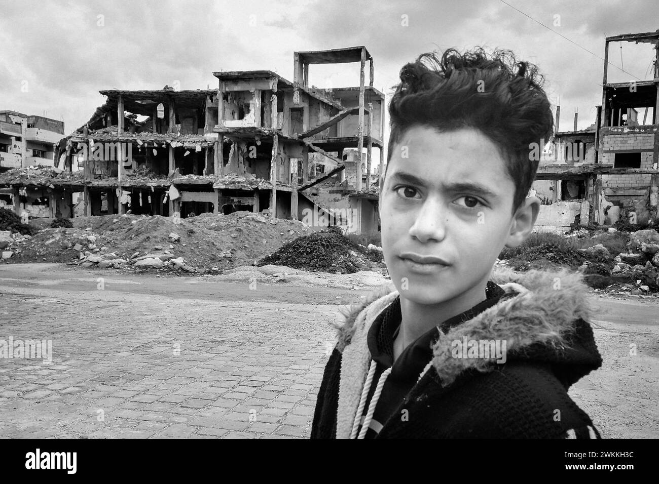 Syria, Homs, bombings on destroyed buildings, boy Stock Photo - Alamy