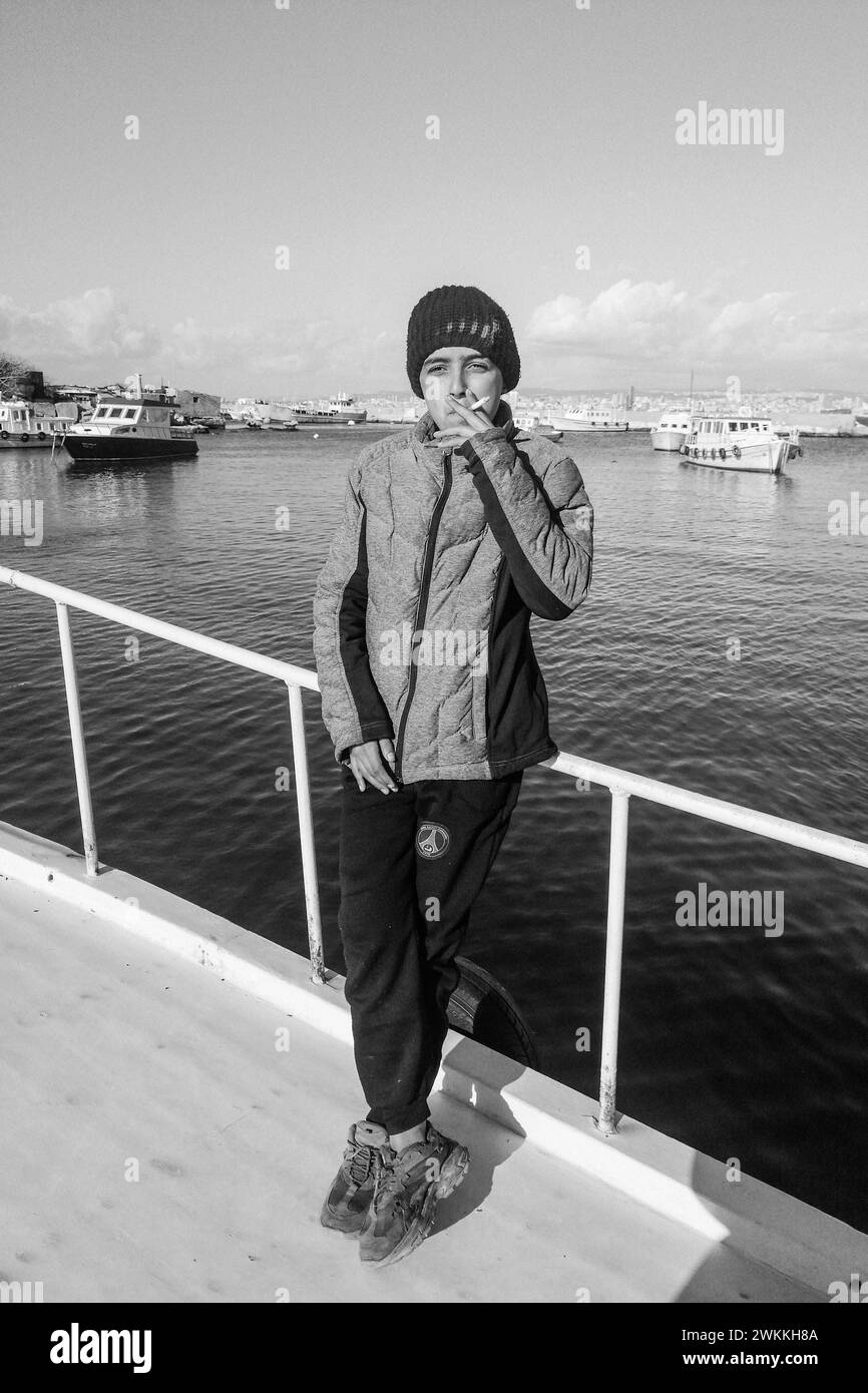 Syria, Arwad island, little boy smoking a cigarette Stock Photo - Alamy