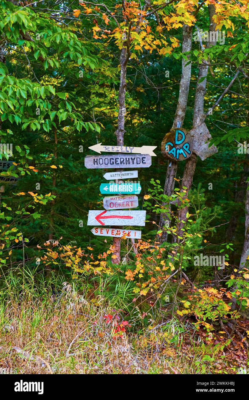 Colorful Handmade Forest Direction Signs in Autumn Stock Photo - Alamy