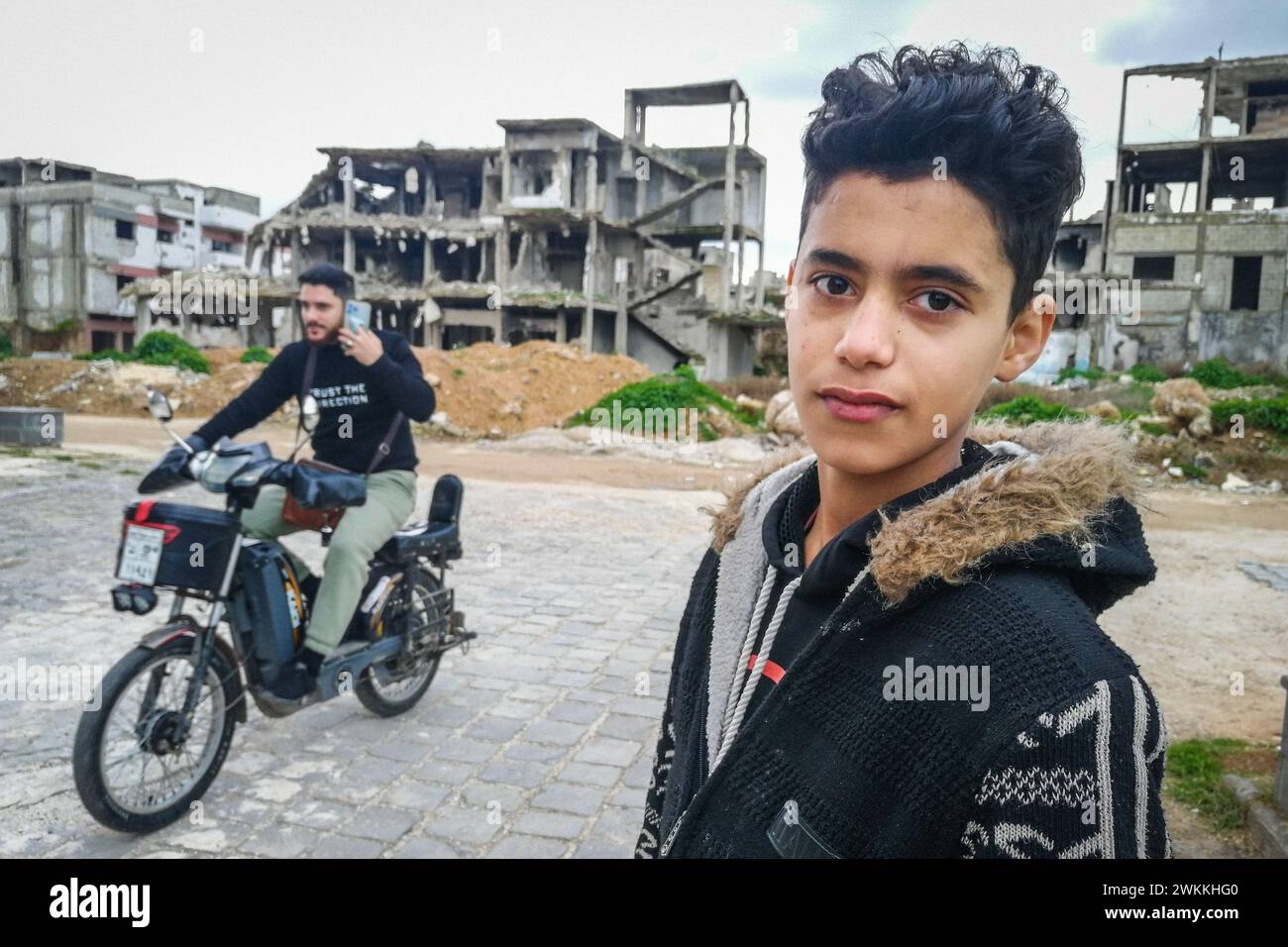 Syria, Homs, bombings on destroyed buildings, boy Stock Photo - Alamy
