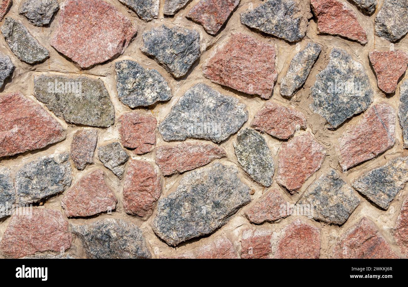 Gray stone wall background. Masonry texture Stock Photo - Alamy