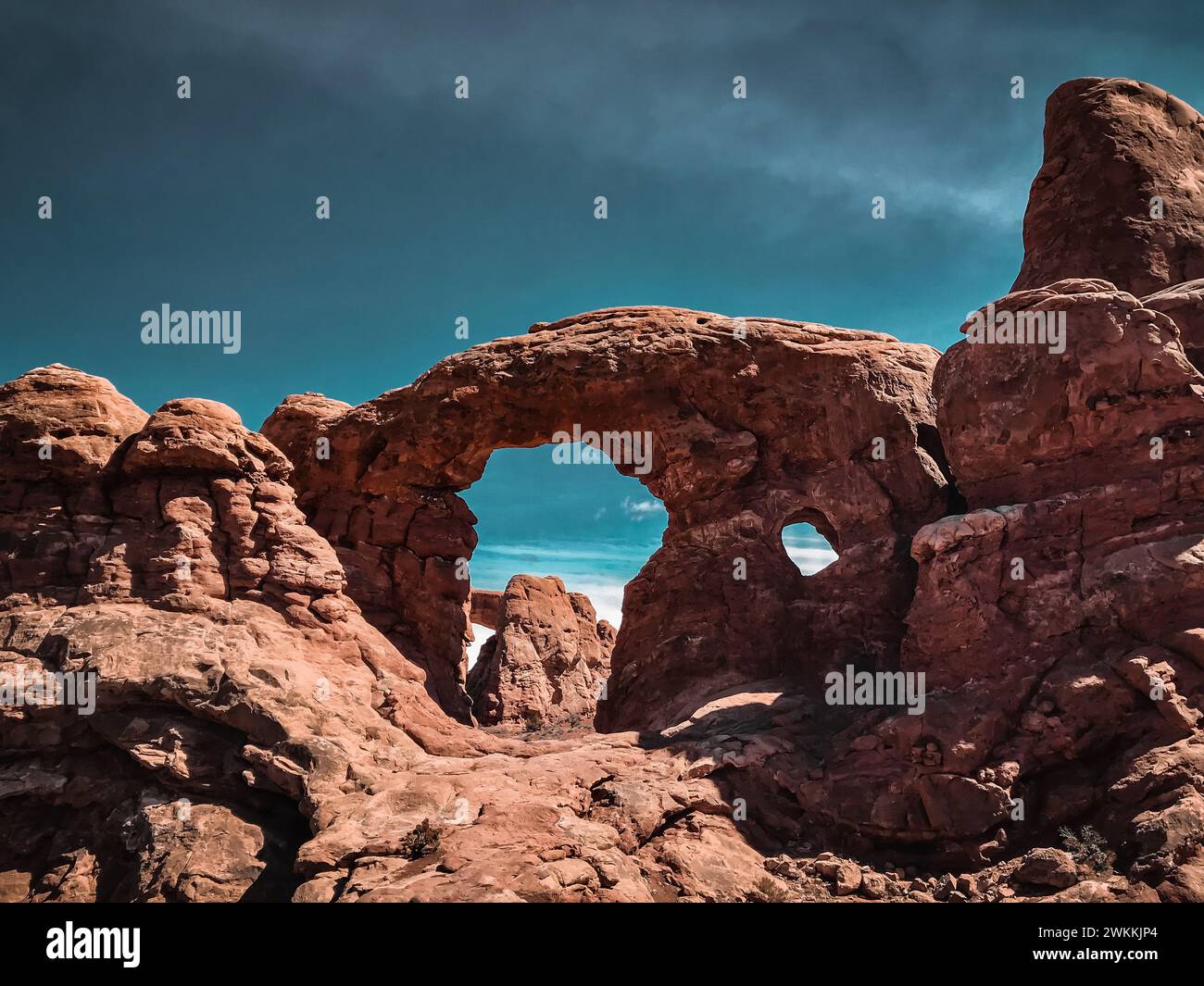 Rock archway and rock window Stock Photo - Alamy