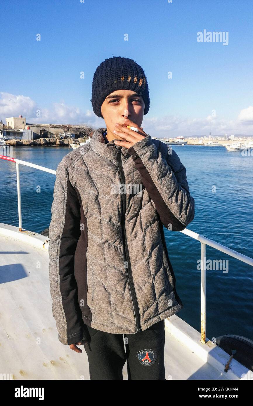 Syria, Arwad island, little boy smoking a cigarette Stock Photo - Alamy