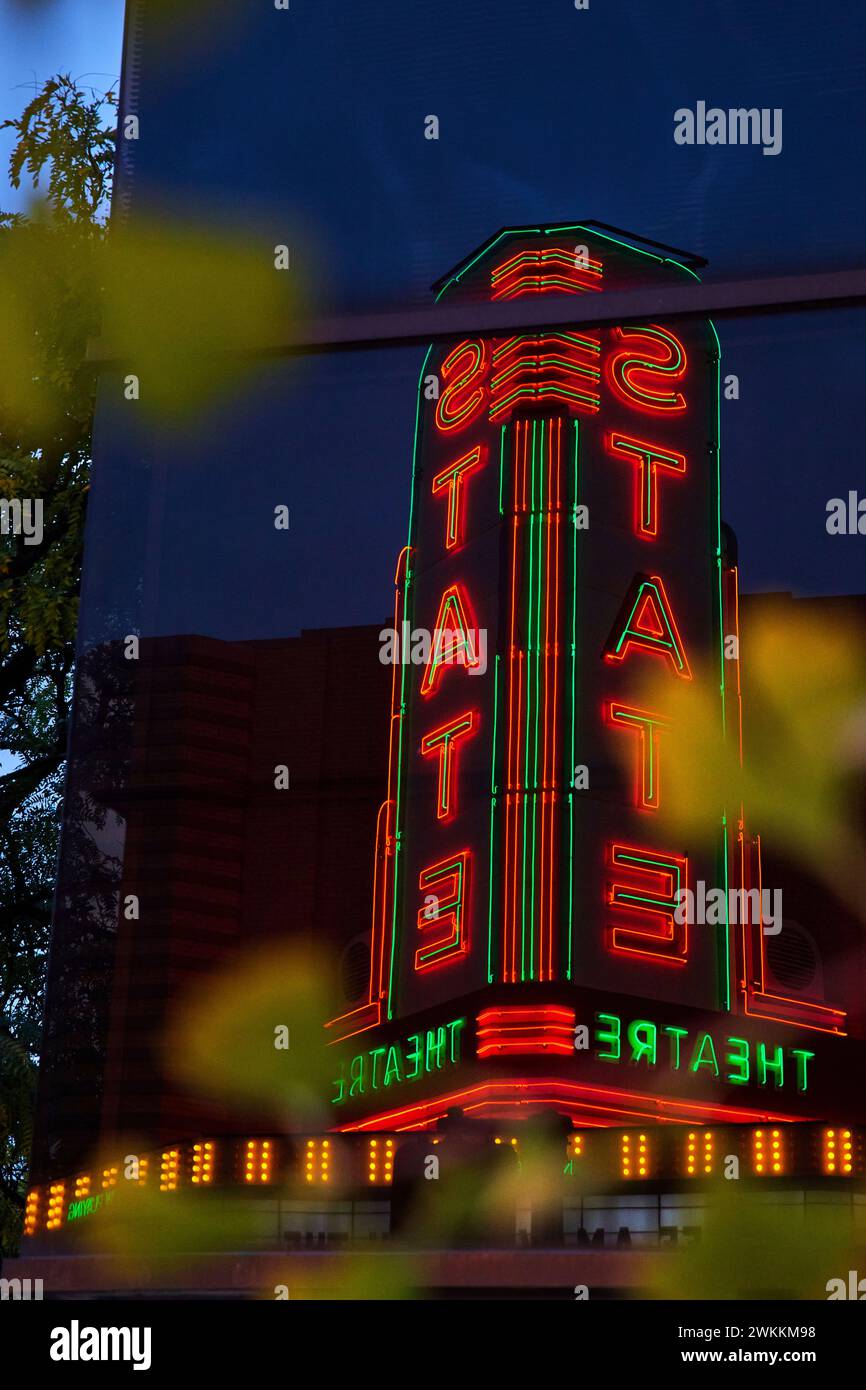 Vintage Theater Neon Sign Reflection at Night Stock Photo - Alamy
