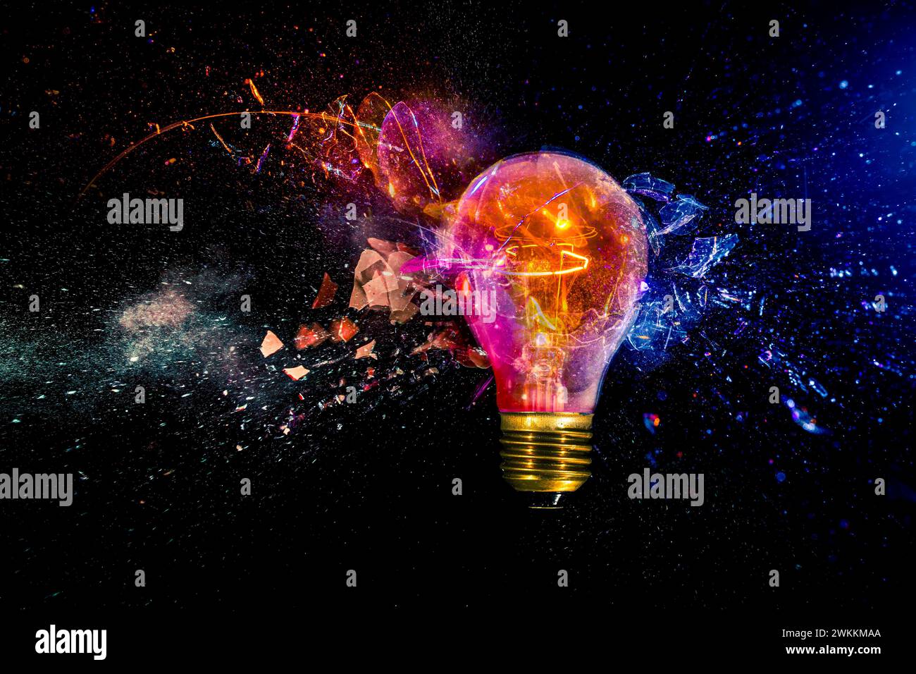 High-speed capture of a light bulb shattering with bright, colorful ...