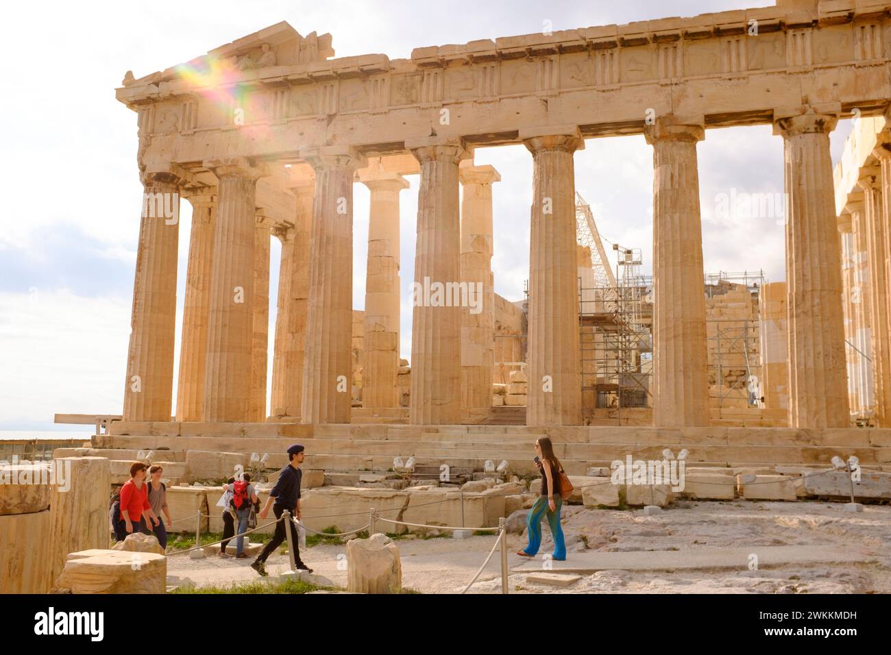 Tourists visit the Parthenon while a storm moves in at the Acropolis in Athens, Greece Stock ...
