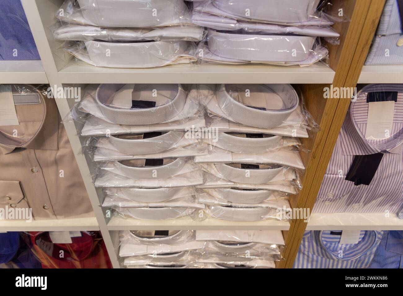 Shirts in a men clothing store. Fashion clothes, Men shirts displayed ...