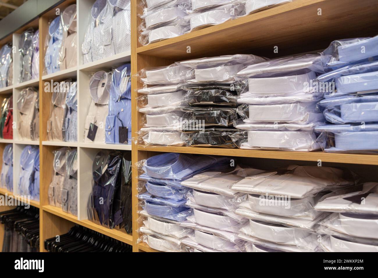 Shirts in a men clothing store. Fashion clothes, Men shirts displayed ...