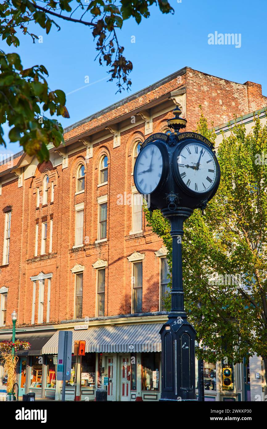 Historic Ypsilanti Street Clock and Brick Building Facade at Sunset ...