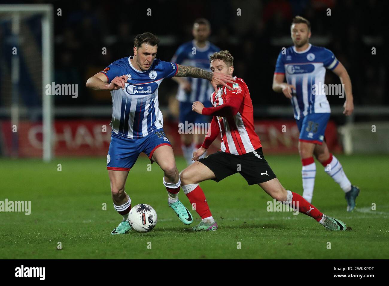 Hartlepool United's Callum Cooke in action with Altrincham's Isaac ...