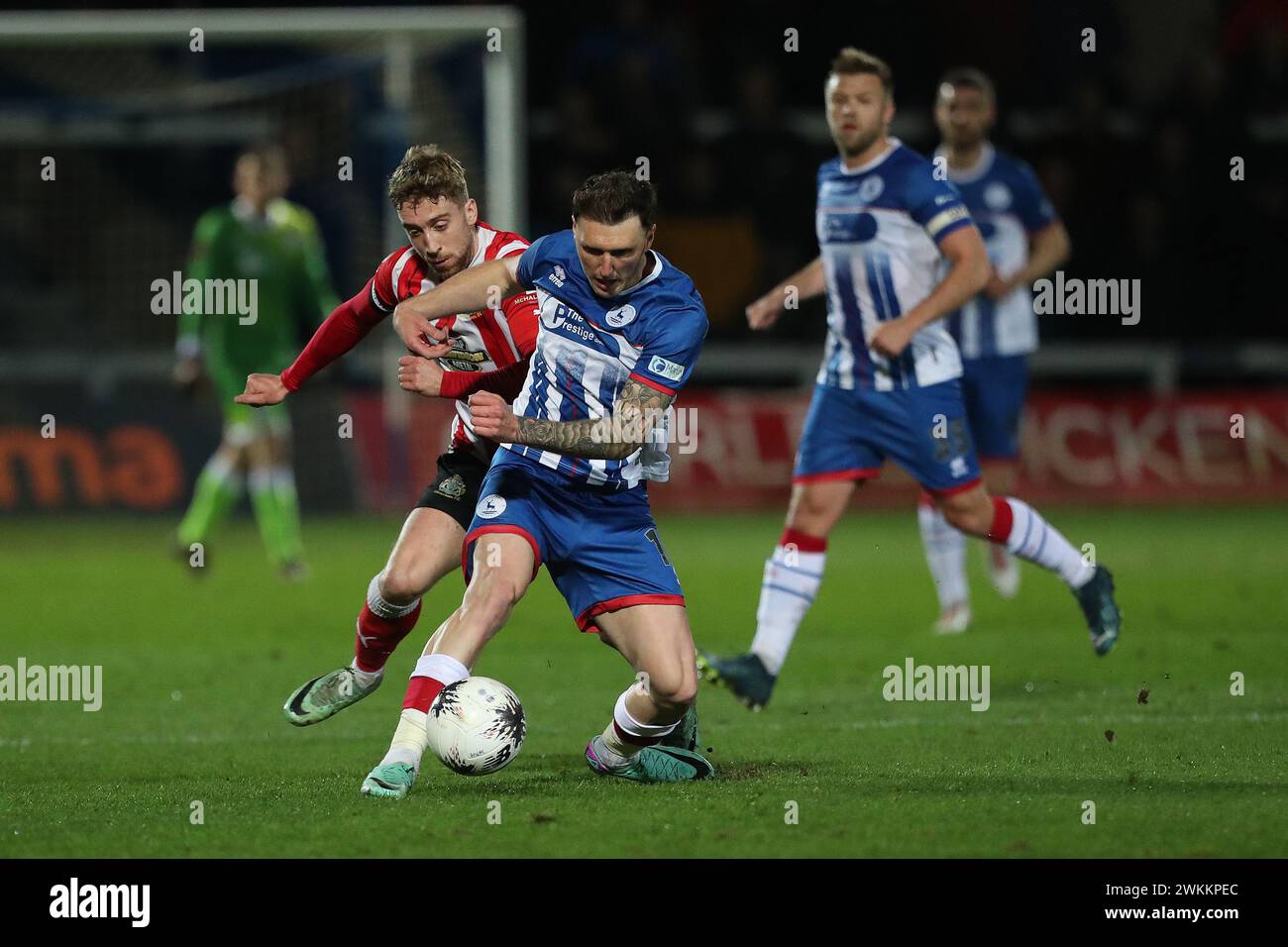 Hartlepool United's Callum Cooke in action with Altrincham's Isaac ...
