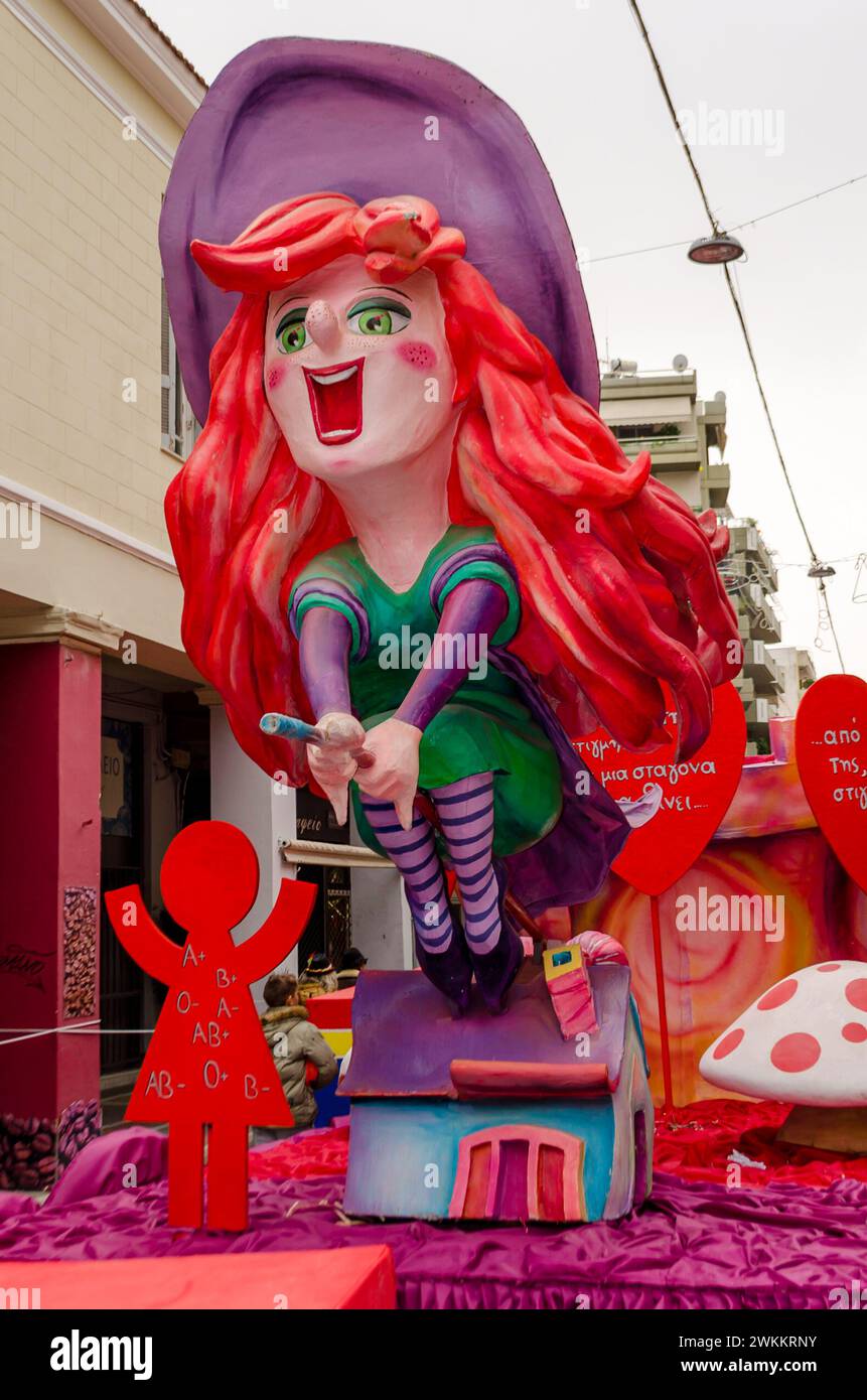Giant Carnival Float with a Colorful Redhead Witch Riding a Broom ...