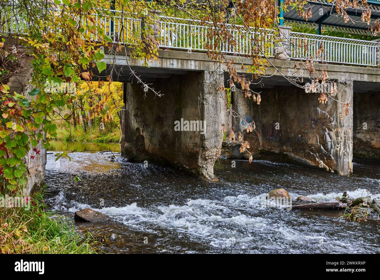 Autumn Bridge Over River with Fall Foliage in Michigan Stock Photo - Alamy