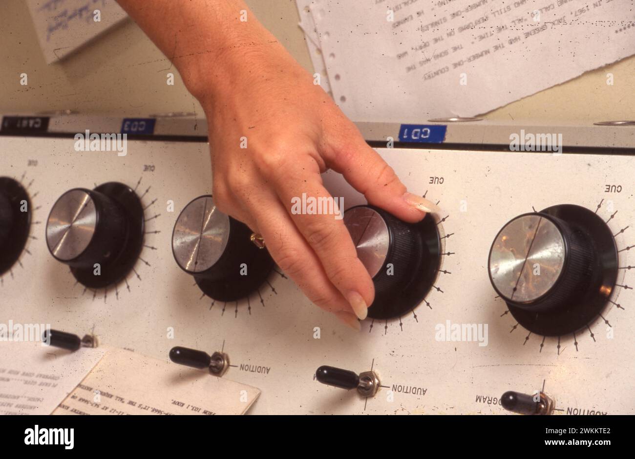 Copperas Cove Texas USA, 1996: Female disc jockey adjusts knob in ...