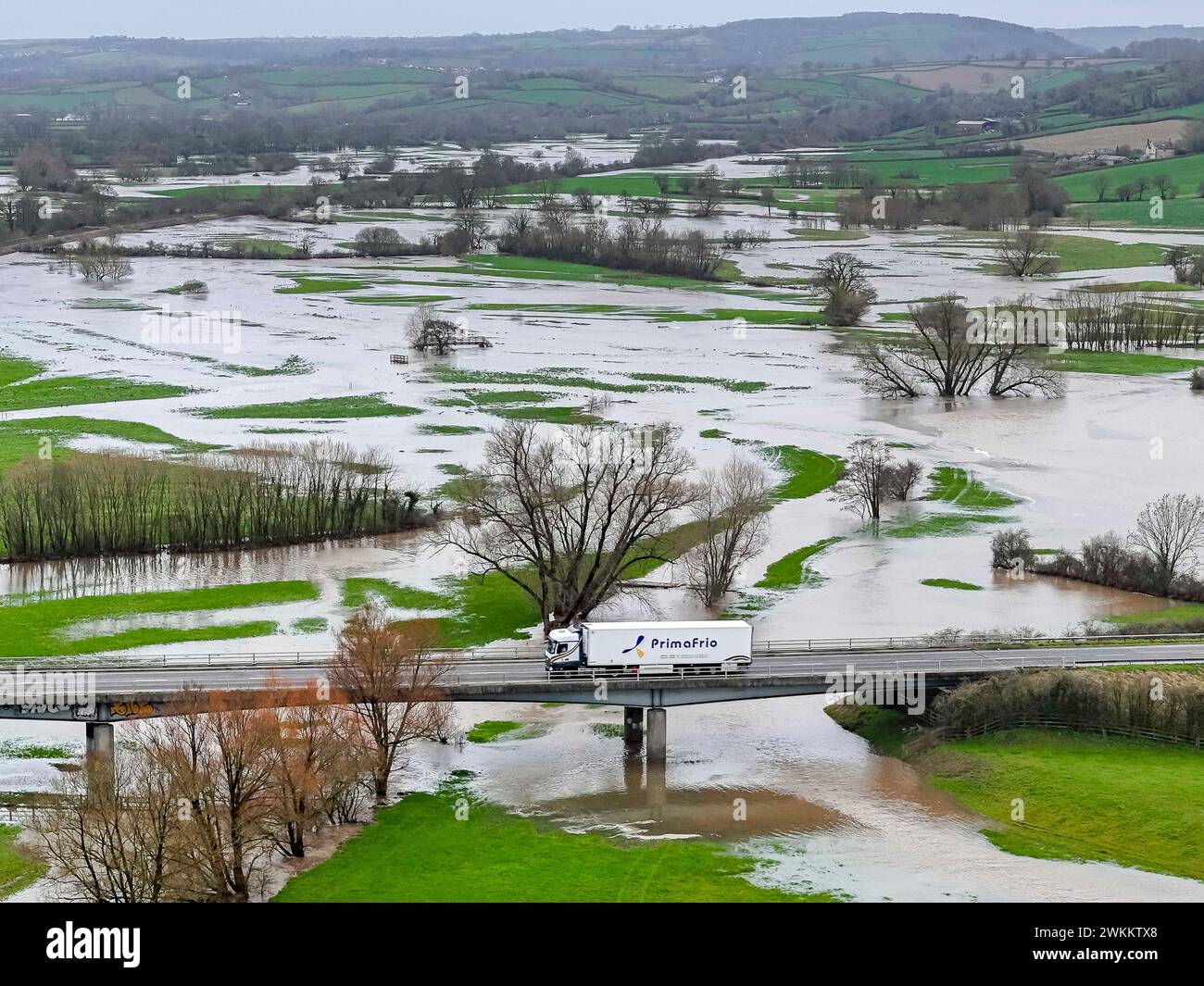 Axminster, Devon, UK. 21st February 2024. UK Weather. Flooded fields at ...