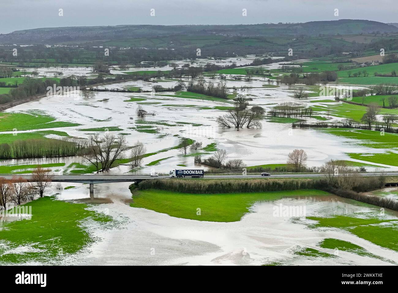 Axminster, Devon, UK. 21st February 2024. UK Weather. Flooded fields at ...