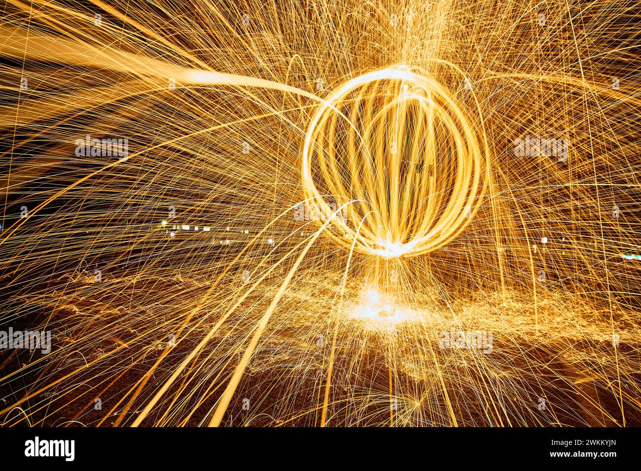 Vibrant Steel Wool Light Painting with Sparks in Motion Stock Photo - Alamy